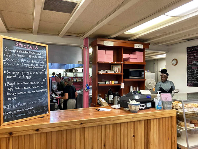 The service counter where dreams come true and cinnamon rolls are dispensed to grateful customers throughout the day.