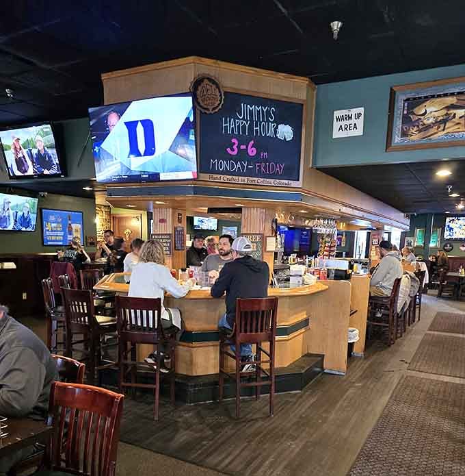 The circular bar serves as the social hub where strangers become friends over shared appetizers and cold drinks throughout the day.