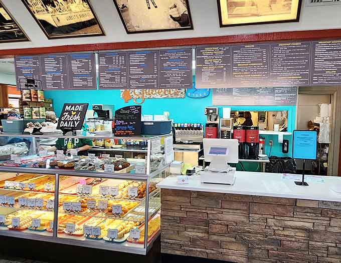 Behind that counter lies the command center of carbohydrate happiness, where magic happens daily before dawn.