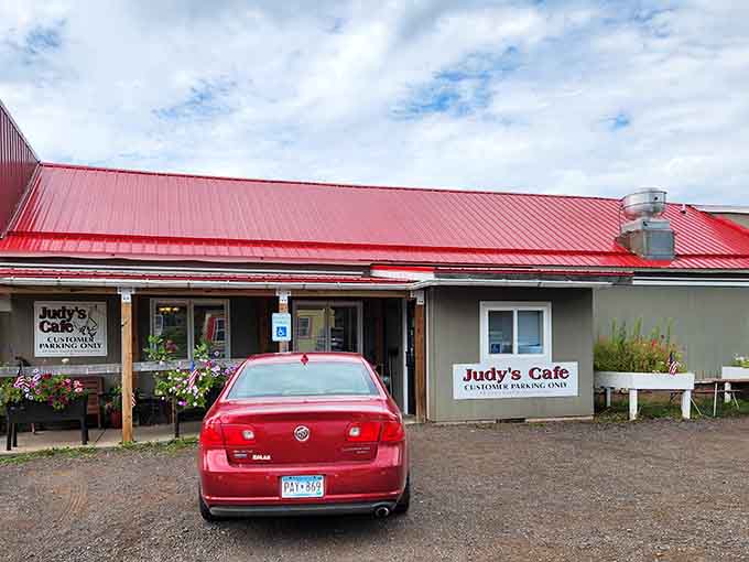 Customer parking only signs mean business, protecting precious spots for folks who know good pie when they taste it and plan accordingly.