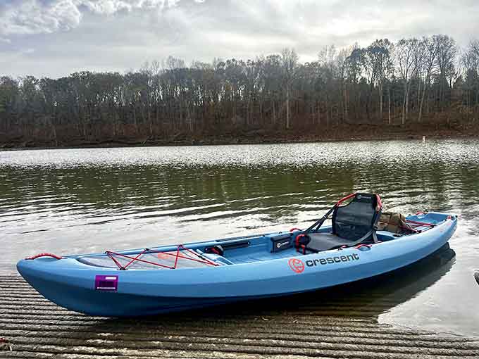 A solo kayak rests on calm waters, offering a moment of zen before the paddling continues toward that castle everyone keeps talking about.