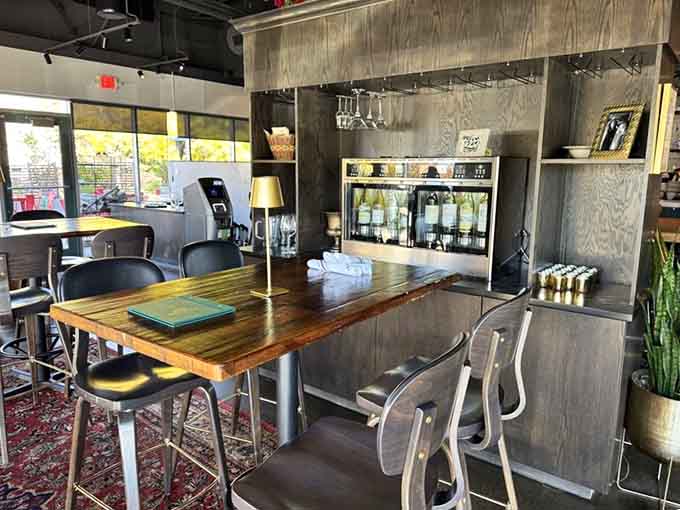 High-top seating near the bar offers prime real estate for watching the restaurant's energy unfold around you.