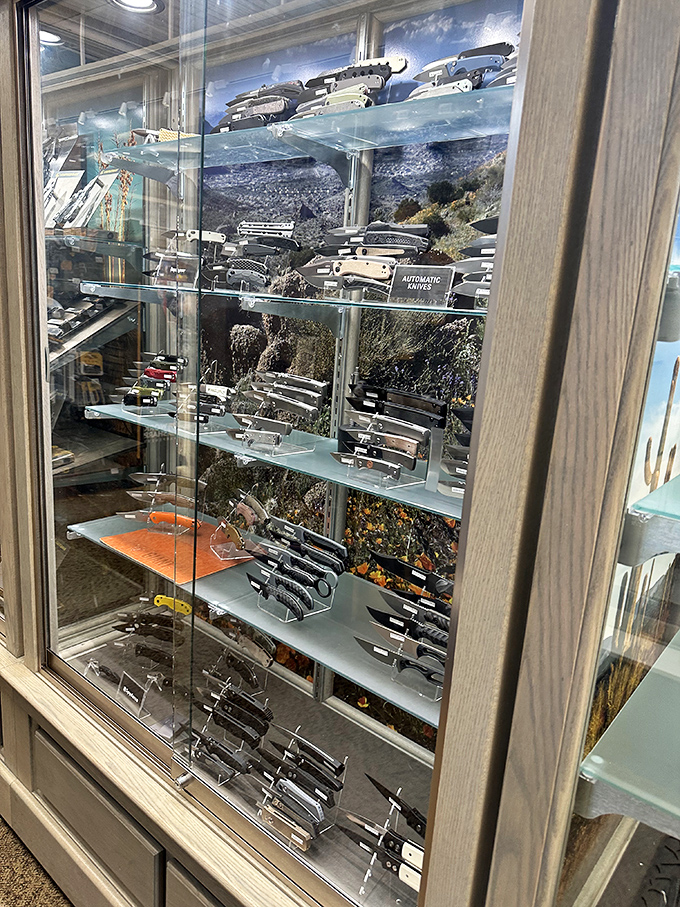 The knife display showcases craftsmanship and utility behind gleaming glass, appealing to collectors and outdoor enthusiasts alike.