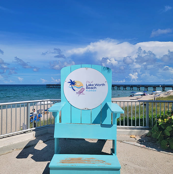 That iconic Lake Worth Beach chair—bigger than your ego after catching the perfect wave. A photo op that practically demands a selfie.