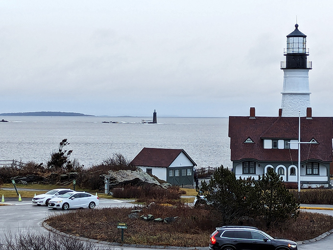 Maine's most photographed lighthouse stands sentinel against the misty Atlantic, a postcard-perfect scene that's been guiding mariners since 1791.