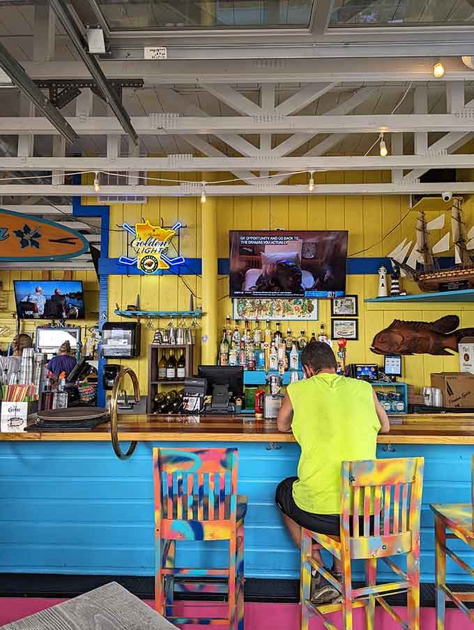 The colorful bar area invites you to pull up a chair and stay awhile, preferably with wings nearby.