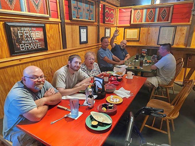 Happy diners enjoying their meals together is exactly what every good restaurant should look like in action.