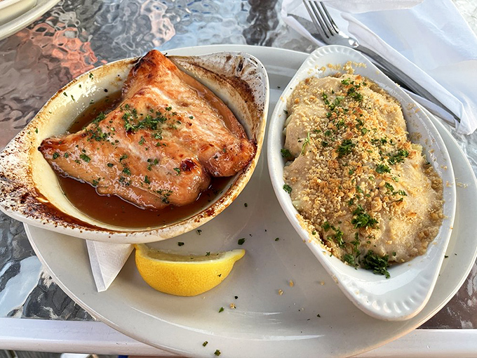 Another angle of the star attraction &ndash; maple-glazed salmon alongside creamy scalloped potatoes that would make any New Englander proud to call this dish local.