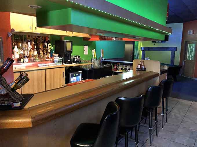 The bar area stands ready to craft margaritas and other beverages that pair perfectly with burritos the size of small pets.