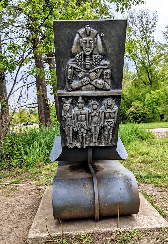 Ancient meets modern in this striking relief, telling stories in metal and shadow against the park's natural canvas