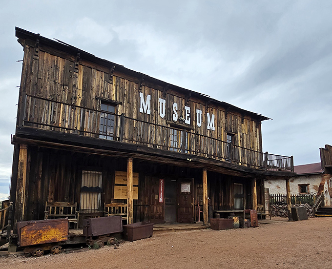 The Museum's weathered facade houses treasures more valuable than gold – the authentic stories and artifacts of Arizona's mining heyday.