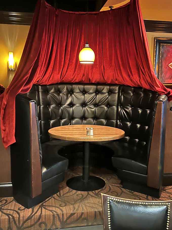 These intimate curtained booths offer the perfect spot for romantic dinners or conversations that deserve a little extra privacy and drama.