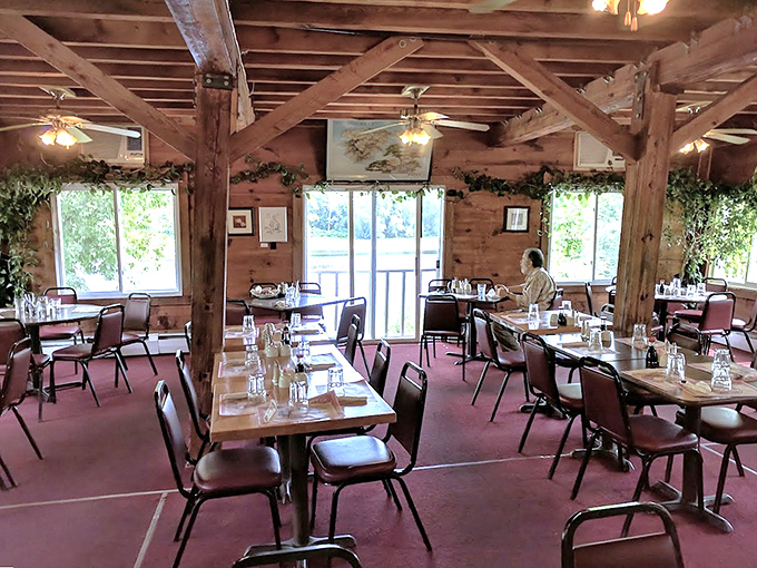 Another angle of the dining room reveals more rustic charm, where wooden beams create a warm, inviting atmosphere.