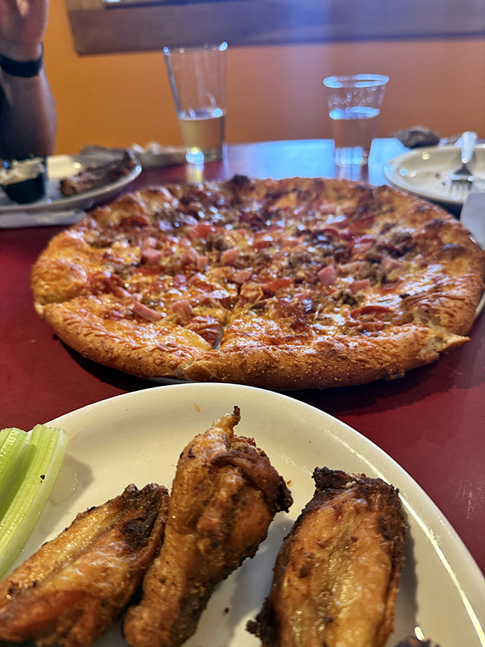 The ultimate Parker Pie experience: wings for the soul, pizza for the heart, and local beer to bring it all together.