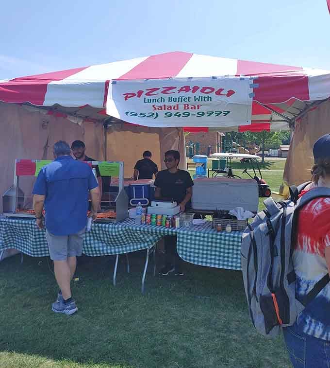 Taking the show on the road, Pizzaioli brings the buffet experience to local events under their signature pink-striped tent.