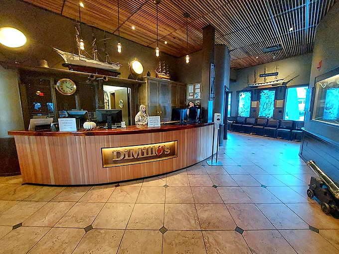 The nautical-themed reception area welcomes guests aboard with the promise of seafood adventures ahead.