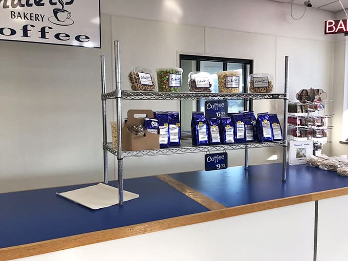 Bags and containers of treats ready for transport, because sometimes you need to bring the bakery experience home in bulk quantities.