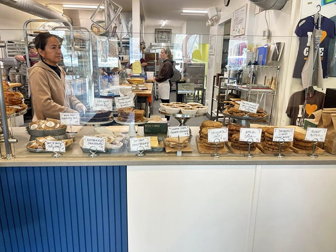 Behind that counter, friendly staff members are ready to help you navigate the delicious decisions ahead, probably while you drool slightly on the glass.