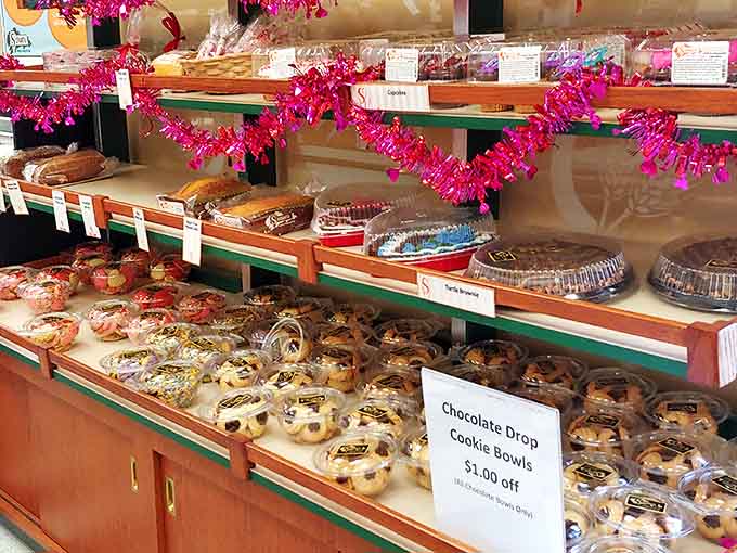 Holiday decorations add festive flair to shelves already groaning with cookies, pastries, and other carb-laden delights.