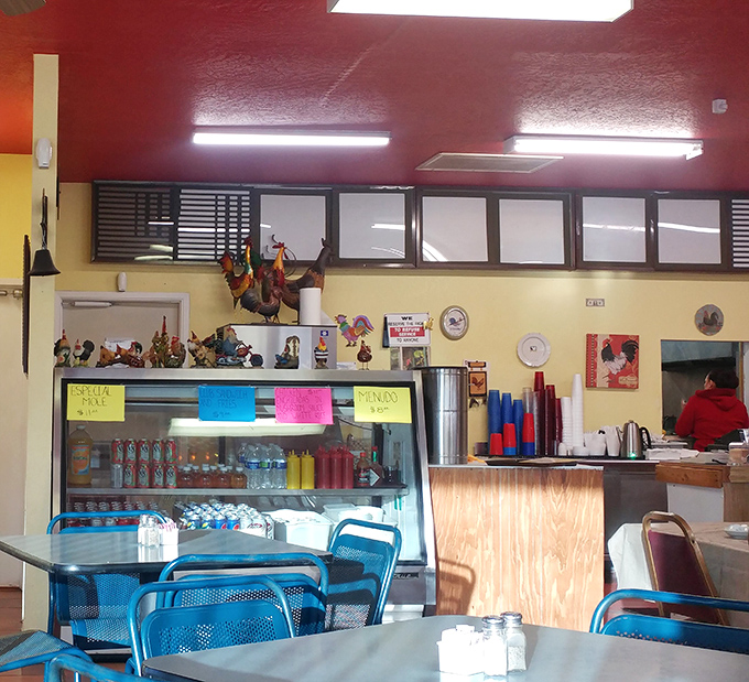 The service counter showcases an impressive collection of rooster figurines &ndash; a quirky touch that adds personality to this unassuming eatery.