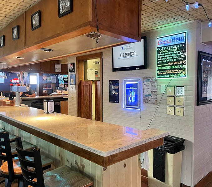 The service counter and kitchen window offer tantalizing glimpses of burger magic happening just beyond your view.