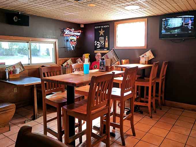 The dining area offers plenty of seating options, from intimate booths to tables perfect for larger groups and celebrations.