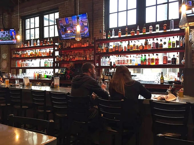 The well-stocked bar beckons with craft cocktails and local brews, staffed by bartenders who know their way around a shaker.