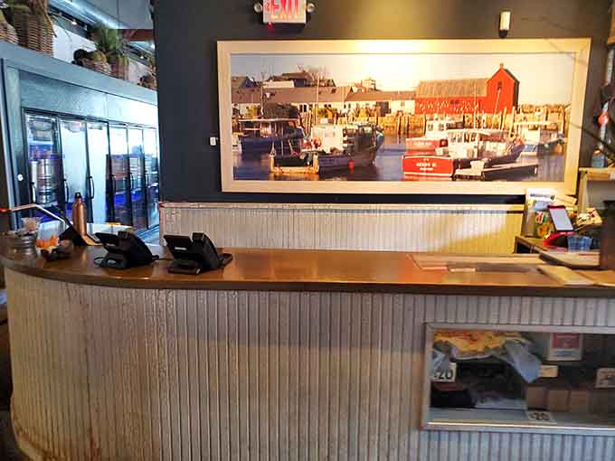 Maritime photography and corrugated metal details transport diners to a New England fishing village without leaving Minnesota.