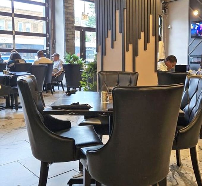 Diners enjoying their meals in a space that feels both upscale and wonderfully unpretentious at once.