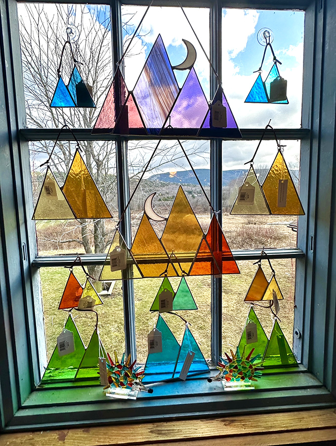 Mountain magic in glass! These colorful stained glass triangles transform ordinary windows into extraordinary prisms of light and Vermont-inspired art.