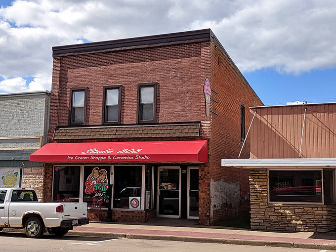 Studio 808's cheerful red awning promises sweet relief on hot summer days &ndash; where ice cream and creativity make the perfect small-town pairing.