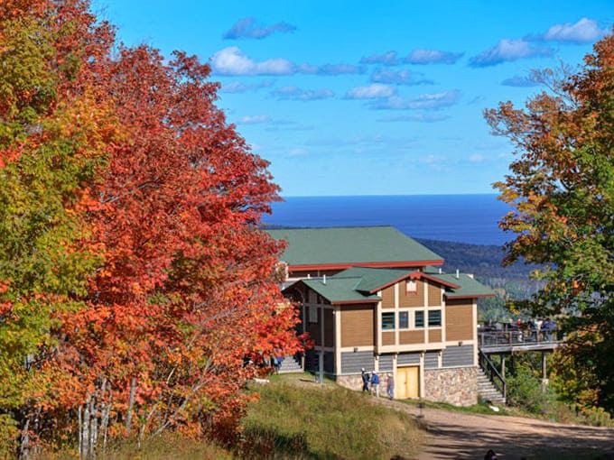 The Summit Chalet building proves that rustic mountain architecture and modern comfort can coexist peacefully, like a truce between camping and civilization.