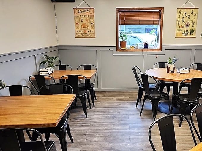 The dining room's clean lines and natural wood create a Scandinavian-inspired space where you can enjoy your meal without feeling like you're in someone's overly decorated living room.
