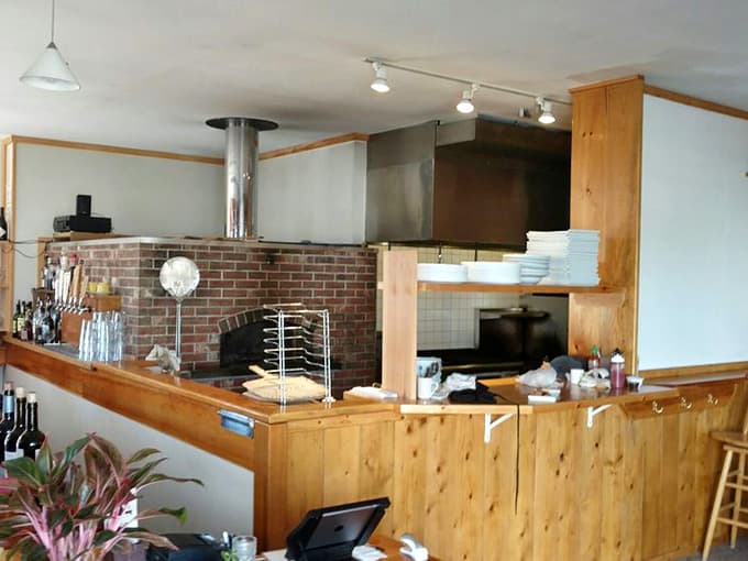 The open kitchen and brick oven let you watch the magic happen, like dinner theater but with better food.