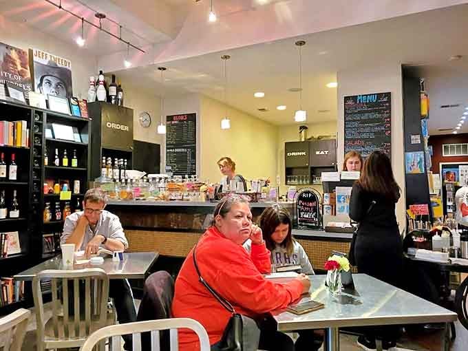 The café area buzzes with quiet energy as readers find their perfect spots to disappear into stories and conversations.