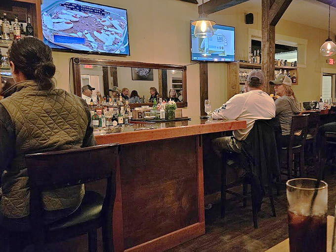 The bar where locals and visitors alike gather to discuss the important things: what to order and whether dessert is negotiable.