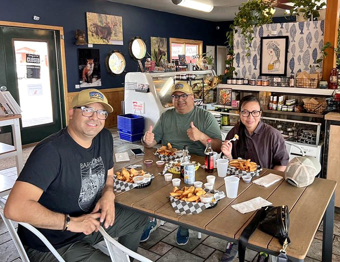 Happy diners enjoying their seafood feast prove that good food and great company create the perfect recipe for memorable moments together.