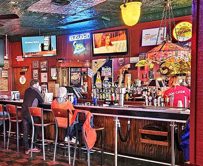 The bar area offers a front-row seat to history, where locals and visitors alike gather to swap stories over cold beers and hot dogs.