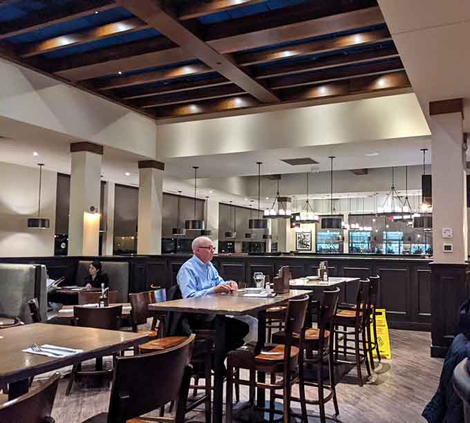 The spacious dining area gives everyone room to breathe, talk, and enjoy without feeling like sardines in fancy clothes.