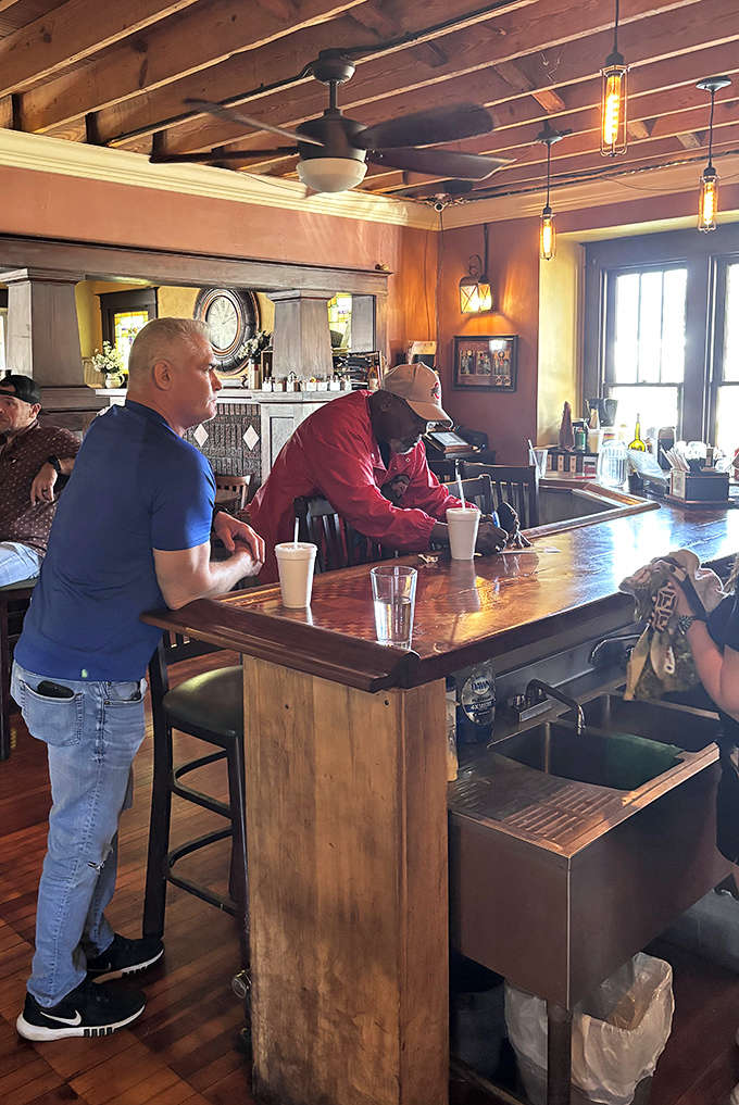 The bar area invites you to settle in, order another round, and contemplate the meaning of life over really exceptional barbecue.