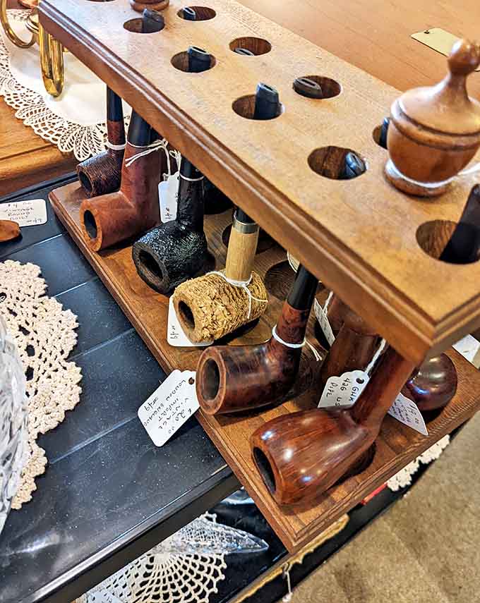 These distinguished pipes once accompanied deep thoughts and important conversations, now resting in dignified retirement like silent philosophers.