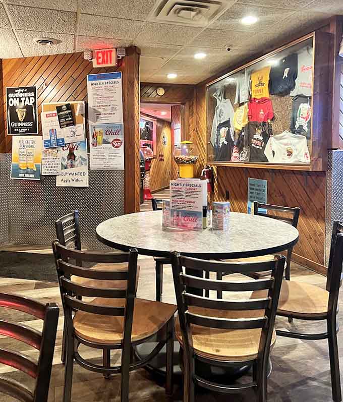 The dining room's casual atmosphere with sports memorabilia and multiple TVs creates an ideal spot for game day gatherings.