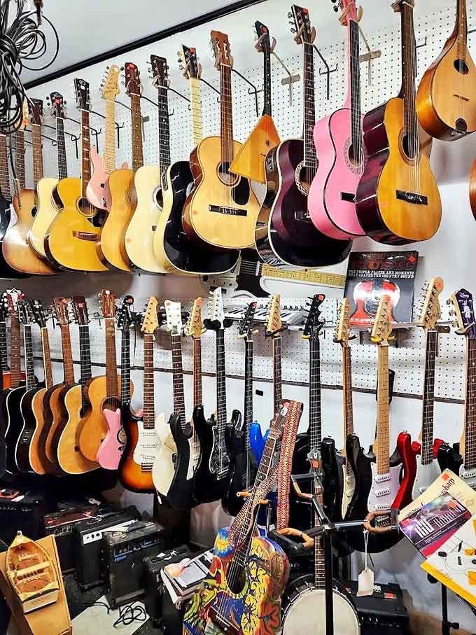 A wall of guitars offers six-string nostalgia for music lovers who remember when instruments were meant to be played, not just displayed.