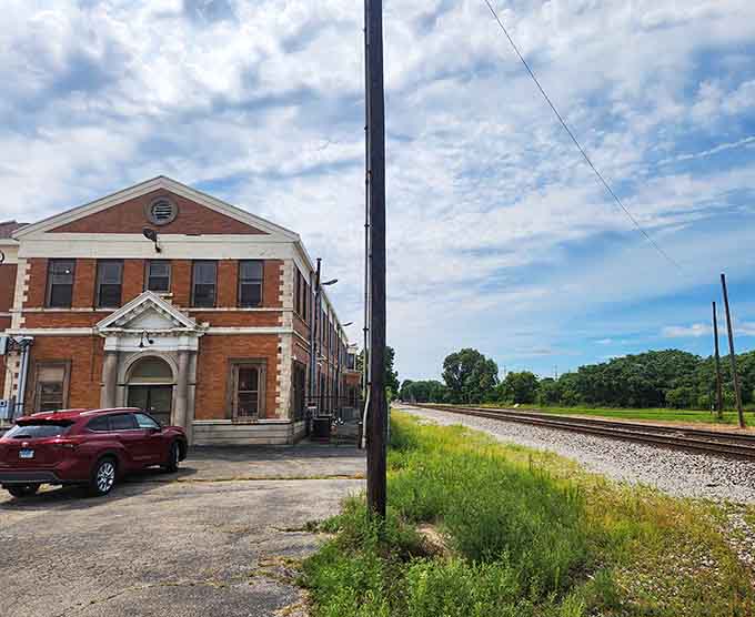 The building sits beside active railroad tracks, providing an authentic soundtrack of rumbling trains to accompany your journey through time and treasures.