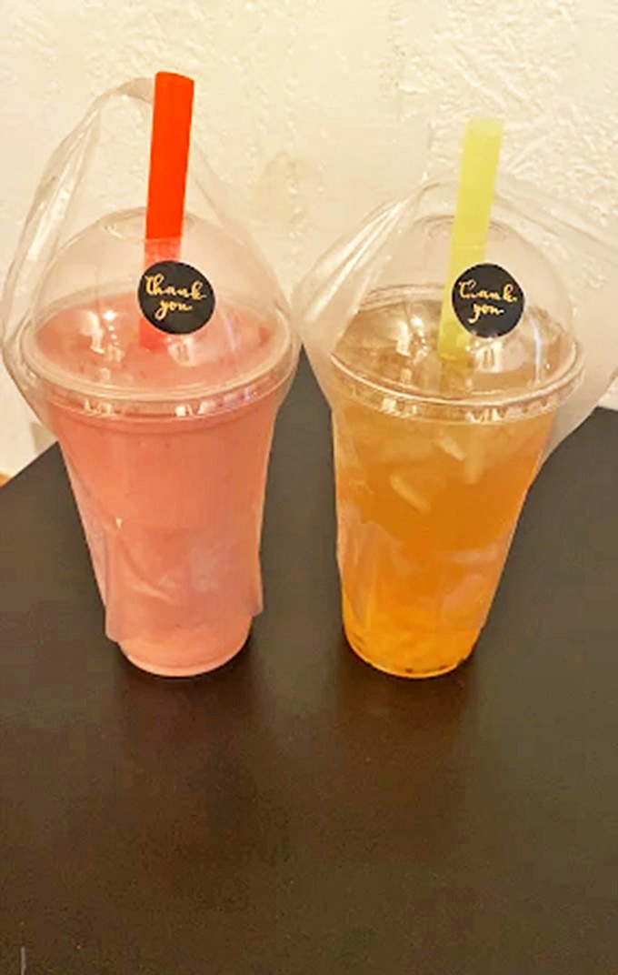 Cold drinks: Vibrant fruit-infused refreshments in clear cups &ndash; like summer captured in liquid form, complete with those fancy "thank you" stickers.