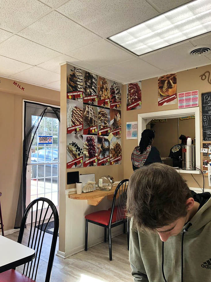 The service counter area is where the magic happens, with staff ready to guide you through the delicious decisions ahead.