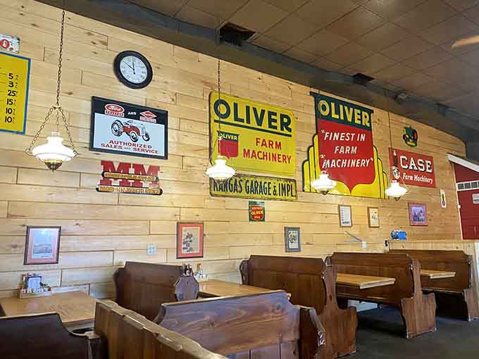 Wooden booths and vintage Oliver Farm Machinery signs transport you to a simpler time when meals were events, not interruptions.