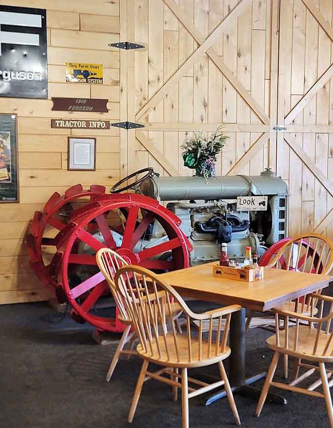 An antique tractor parked among the dining tables isn't just decor, it's a conversation starter and a reminder of the area's agricultural roots.
