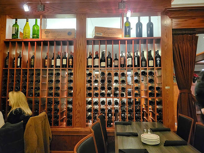 The wine display isn't just storage&mdash;it's a library of possibilities waiting to be uncorked. Each bottle tells a different story; which one will accompany yours tonight?