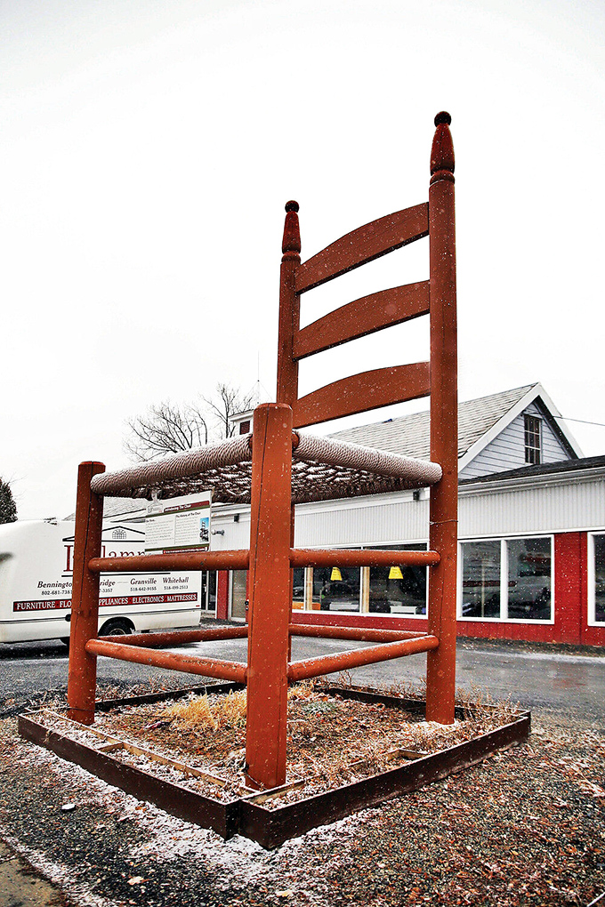Winter transforms the giant chair into a snow-dusted monument. Jack Frost himself might perch here, overseeing his handiwork across the Vermont landscape with frosty satisfaction.